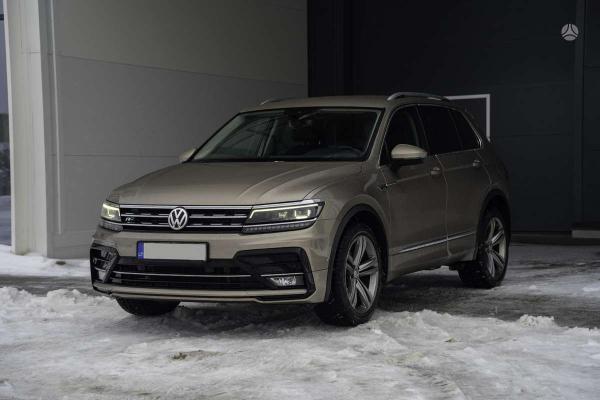 Yellow Volkswagen Tiguan 2018 in Vilnius, with an engine capacity of 1.97 L and mileage of 135 thousand km for 23100 €, photo 4 on AUTOMOTO.COM.LV