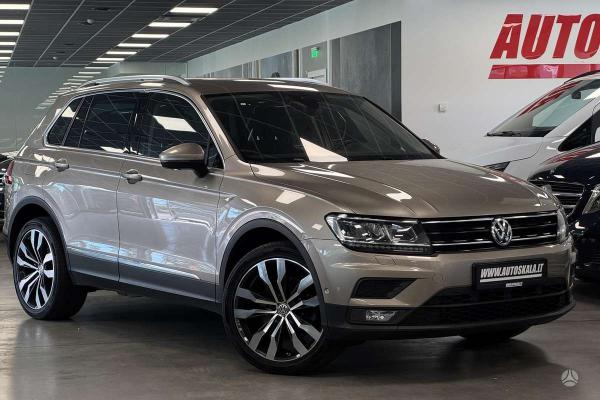 Yellow Volkswagen Tiguan 2018 in Klaipeda, with an engine capacity of 1.97 L and mileage of 261 thousand km for 17950 €, photo 2 on AUTOMOTO.COM.LV