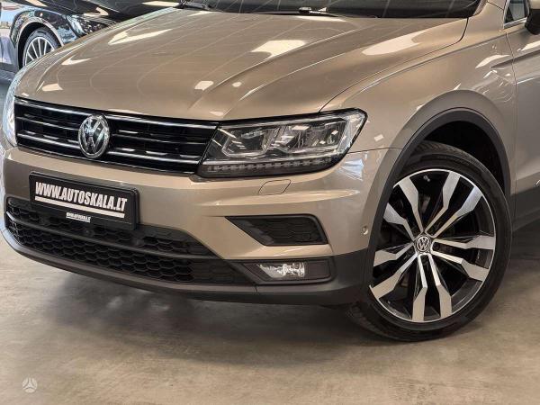 Yellow Volkswagen Tiguan 2018 in Klaipeda, with an engine capacity of 1.97 L and mileage of 261 thousand km for 17950 €, photo 8 on AUTOMOTO.COM.LV