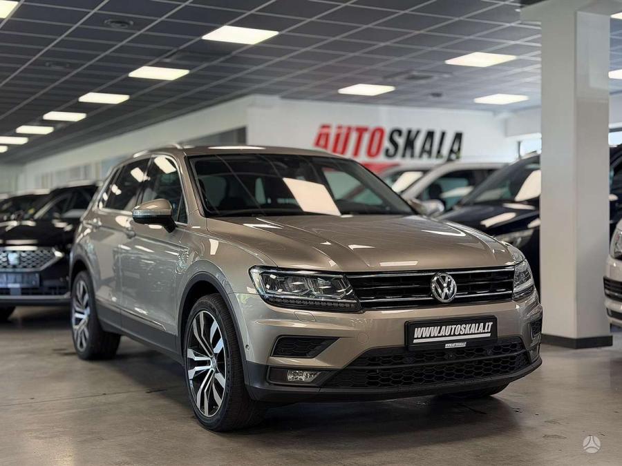Yellow Volkswagen Tiguan 2018 in Klaipeda, with an engine capacity of 1.97 L and mileage of 261 thousand km for 17950 €, photo 4 on AUTOMOTO.COM.LV