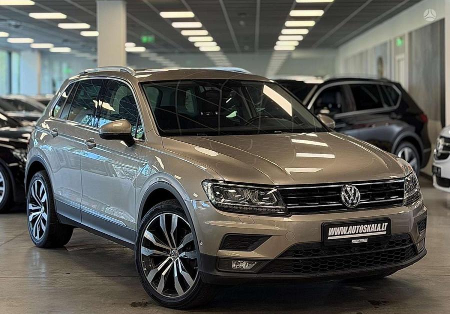 Yellow Volkswagen Tiguan 2018 in Klaipeda, with an engine capacity of 1.97 L and mileage of 261 thousand km for 17950 €, photo 6 on AUTOMOTO.COM.LV