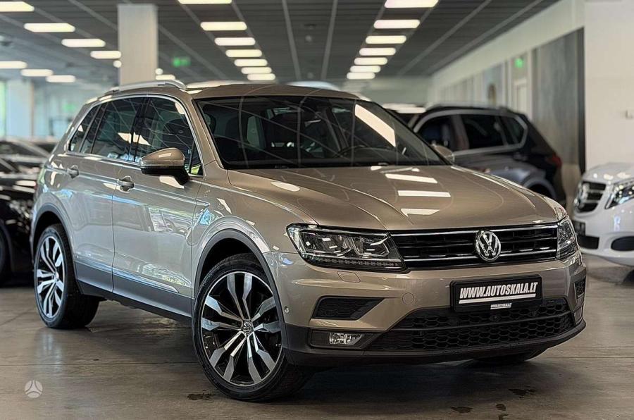 Yellow Volkswagen Tiguan 2018 in Klaipeda, with an engine capacity of 1.97 L and mileage of 261 thousand km for 17950 €, photo 12 on AUTOMOTO.COM.LV