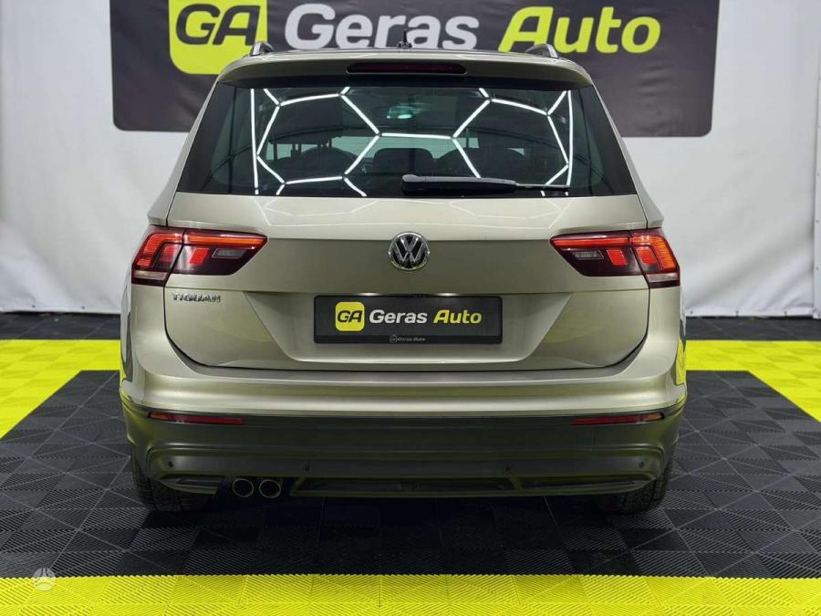 Yellow Volkswagen Tiguan 2019 in Vilnius, with an engine capacity of 1.97 L and mileage of 110 thousand km for 19490 €, photo 5 on AUTOMOTO.COM.LV