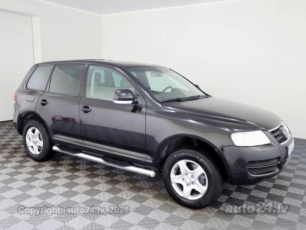Melns Volkswagen Touareg 2003 Tallina, ar dzinēja tilpumu 3.20 L un nobraukumu 209 tūkst. km par 1799 €, foto 1 vietnē AUTOMOTO.COM.LV