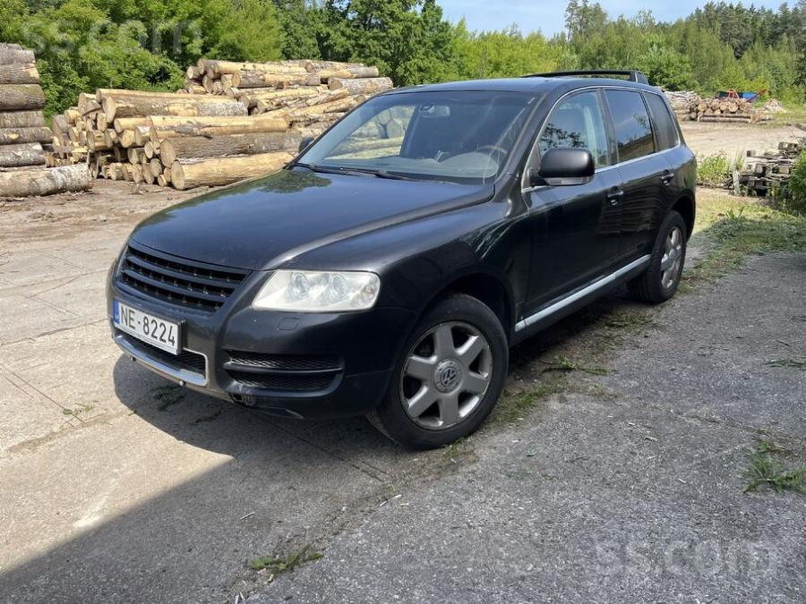 Melns Volkswagen Touareg 2004 Rīga, ar dzinēja tilpumu 5.00 L un nobraukumu 310 tūkst. km par 39900 €, foto 1 vietnē AUTOMOTO.COM.LV