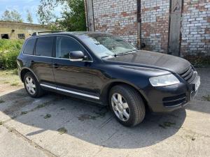 Melns Volkswagen Touareg 2004 Rīga, ar dzinēja tilpumu 5.00 L un nobraukumu 310 tūkst. km par 39900 €, foto 2 vietnē AUTOMOTO.COM.LV