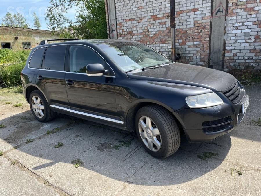Melns Volkswagen Touareg 2004 Rīga, ar dzinēja tilpumu 5.00 L un nobraukumu 310 tūkst. km par 39900 €, foto 2 vietnē AUTOMOTO.COM.LV