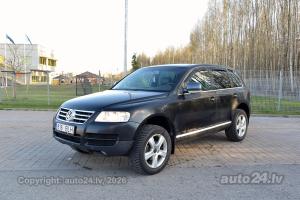 Melns Volkswagen Touareg 2004 Tartu, ar dzinēja tilpumu 2.50 L un nobraukumu 300 tūkst. km par 3550 €, foto 3 vietnē AUTOMOTO.COM.LV