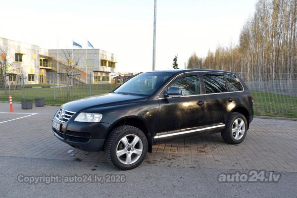 Black Volkswagen Touareg 2004 in Tartu, with an engine capacity of 2.50 L and mileage of 300 thousand km for 3550 €, photo 3 on AUTOMOTO.COM.LV