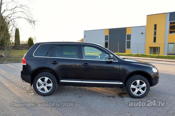 Black Volkswagen Touareg 2004 in Tartu, with an engine capacity of 2.50 L and mileage of 300 thousand km for 3550 €, photo 6 on AUTOMOTO.COM.LV