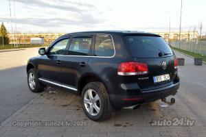 Melns Volkswagen Touareg 2004 Tartu, ar dzinēja tilpumu 2.50 L un nobraukumu 300 tūkst. km par 3550 €, foto 8 vietnē AUTOMOTO.COM.LV