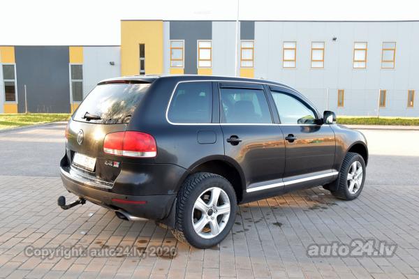 Black Volkswagen Touareg 2004 in Tartu, with an engine capacity of 2.50 L and mileage of 300 thousand km for 3550 €, photo 9 on AUTOMOTO.COM.LV