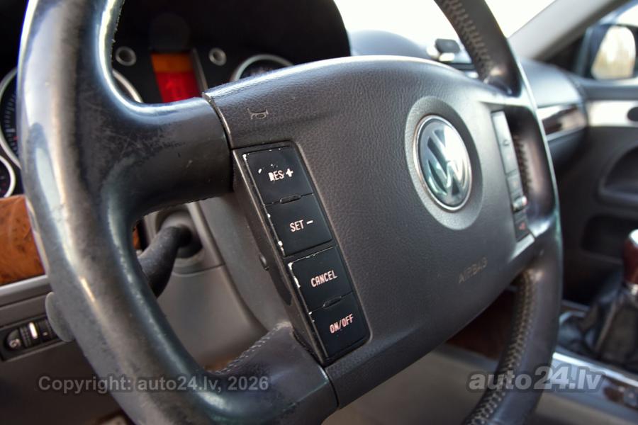 Melns Volkswagen Touareg 2004 Tartu, ar dzinēja tilpumu 2.50 L un nobraukumu 300 tūkst. km par 3550 €, foto 27 vietnē AUTOMOTO.COM.LV