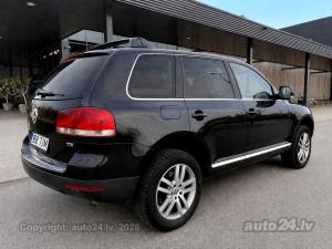 Melns Volkswagen Touareg 2004 Tartu, ar dzinēja tilpumu 2.50 L un nobraukumu 430 tūkst. km par 2490 €, foto 4 vietnē AUTOMOTO.COM.LV