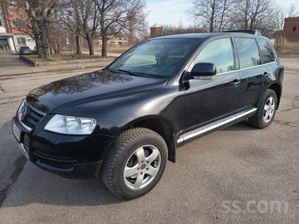 Melns Volkswagen Touareg 2004 Liepāja, ar dzinēja tilpumu 3.20 L un nobraukumu 252 tūkst. km par 5000 €, foto 2 vietnē AUTOMOTO.COM.LV