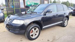 Melns Volkswagen Touareg 2004 Rīga, ar dzinēja tilpumu 2.50 L un nobraukumu 526 tūkst. km par 2500 €, foto  vietnē AUTOMOTO.COM.LV