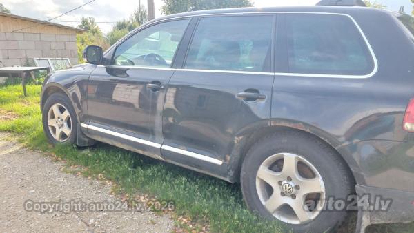 Volkswagen Touareg 2004 Jegeva vietnÄ Melns Volkswagen Touareg 2004 Jegeva, ar dzinÄja tilpumu 2.50 L un nobraukumu 570 tÅ«kst. km par 1500 ā¬, foto 7 vietnÄ AUTOMOTO.COM.LV
