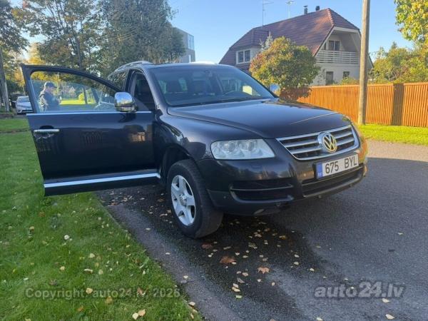 Melns Volkswagen Touareg 2004 Tallina, ar dzinēja tilpumu 2.50 L un nobraukumu 360 tūkst. km par 1990 €, foto 1 vietnē AUTOMOTO.COM.LV