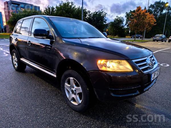 Melns Volkswagen Touareg 2005 Rīga, ar dzinēja tilpumu 2.50 L un nobraukumu 335 tūkst. km par 2199 €, foto 2 vietnē AUTOMOTO.COM.LV