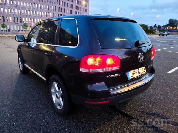 Melns Volkswagen Touareg 2005 Rīga, ar dzinēja tilpumu 2.50 L un nobraukumu 335 tūkst. km par 2199 €, foto 4 vietnē AUTOMOTO.COM.LV