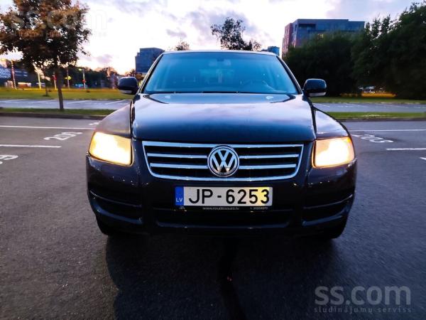 Melns Volkswagen Touareg 2005 Rīga, ar dzinēja tilpumu 2.50 L un nobraukumu 335 tūkst. km par 2199 €, foto 6 vietnē AUTOMOTO.COM.LV