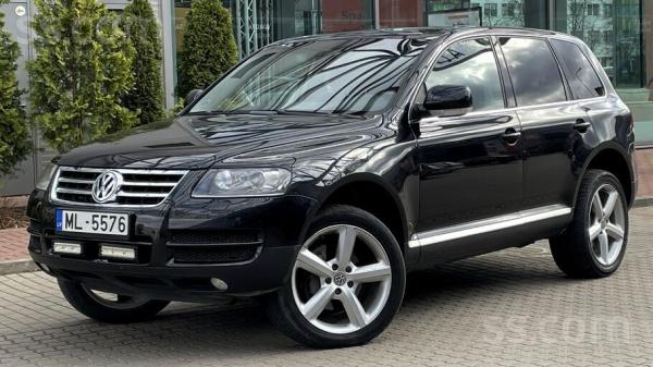 Melns Volkswagen Touareg 2005 Rīga, ar dzinēja tilpumu 3.00 L un nobraukumu 342 tūkst. km par 3850 €, foto 3 vietnē AUTOMOTO.COM.LV