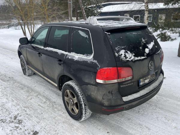 Melns Volkswagen Touareg 2005 Viļņa, ar dzinēja tilpumu 2.97 L un nobraukumu 419 tūkst. km par 2650 €, foto 6 vietnē AUTOMOTO.COM.LV