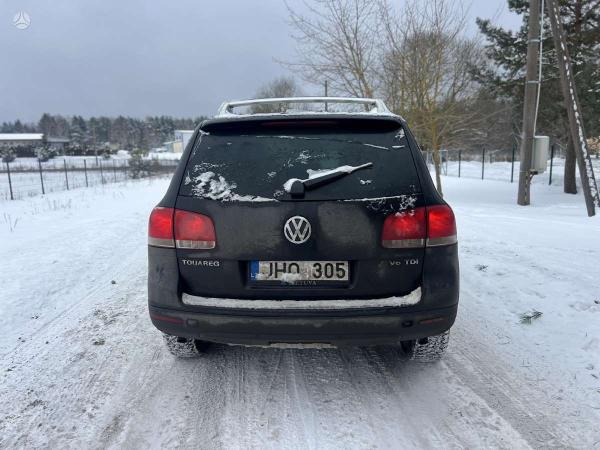 Melns Volkswagen Touareg 2005 Viļņa, ar dzinēja tilpumu 2.97 L un nobraukumu 419 tūkst. km par 2650 €, foto 7 vietnē AUTOMOTO.COM.LV