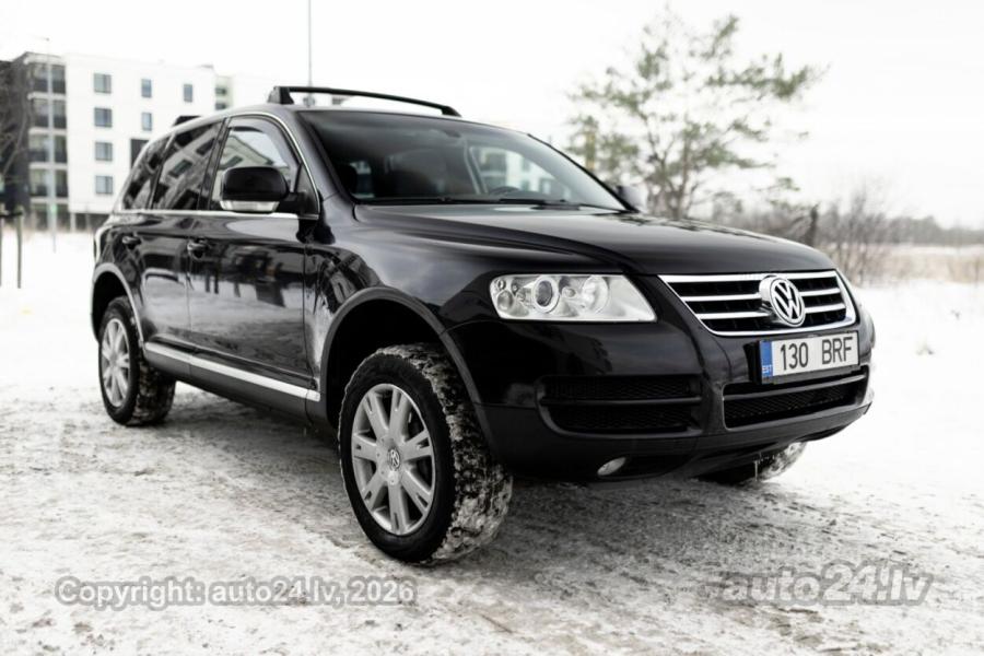 Black Volkswagen Touareg 2005 in Tallinn, with an engine capacity of 3.00 L and mileage of 337 thousand km for 4999 €, photo 1 on AUTOMOTO.COM.LV