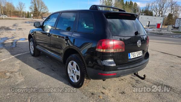 Black Volkswagen Touareg 2005 in Jogeva, with an engine capacity of 3.00 L and mileage of 339 thousand km for 4200 €, photo 2 on AUTOMOTO.COM.LV