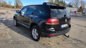 Black Volkswagen Touareg 2005 in Jogeva, with an engine capacity of 3.00 L and mileage of 339 thousand km for 4200 €, photo 2 on AUTOMOTO.COM.LV