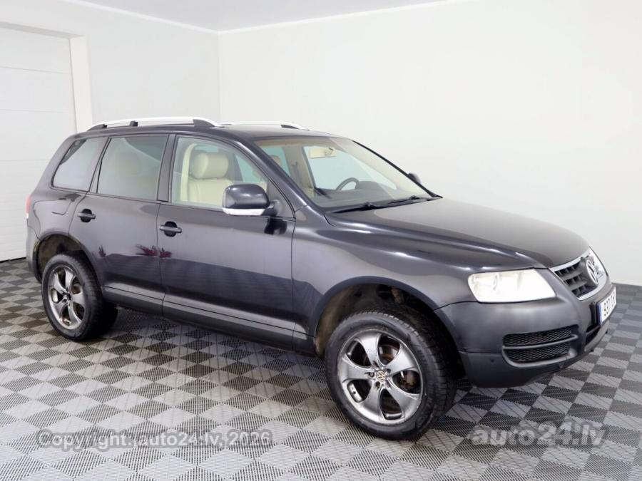 Melns Volkswagen Touareg 2005 Tallina, ar dzinēja tilpumu 2.50 L un nobraukumu 325 tūkst. km par 2499 €, foto 1 vietnē AUTOMOTO.COM.LV