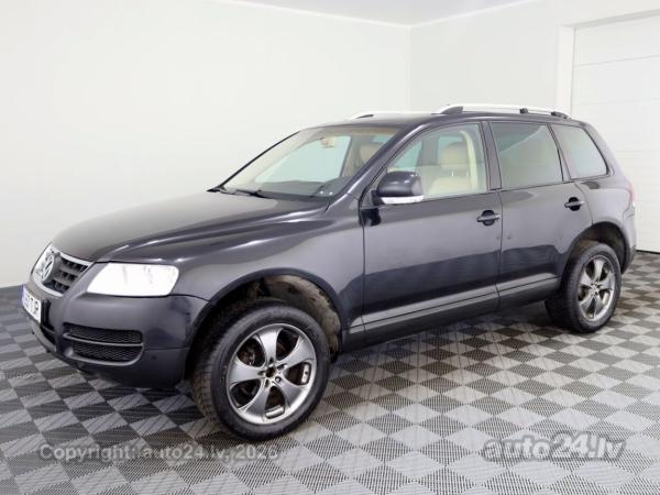 Melns Volkswagen Touareg 2005 Tallina, ar dzinēja tilpumu 2.50 L un nobraukumu 325 tūkst. km par 2499 €, foto 2 vietnē AUTOMOTO.COM.LV