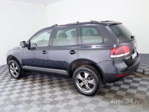 Melns Volkswagen Touareg 2005 Tallina, ar dzinēja tilpumu 2.50 L un nobraukumu 325 tūkst. km par 2499 €, foto 4 vietnē AUTOMOTO.COM.LV