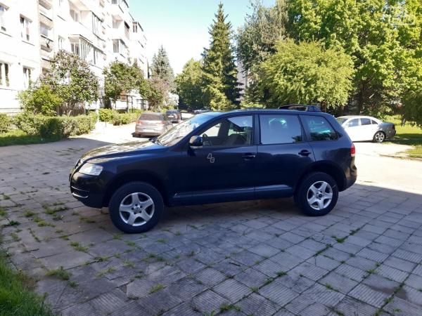 Melns Volkswagen Touareg 2005 Kauņa, ar dzinēja tilpumu 2.50 L un nobraukumu 200 tūkst. km par 2500 €, foto 1 vietnē AUTOMOTO.COM.LV