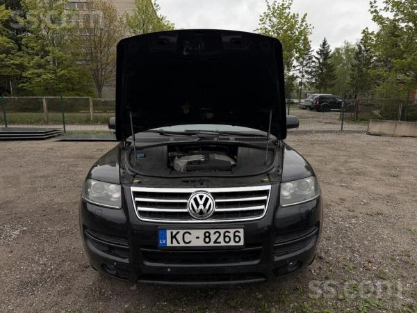 Melns Volkswagen Touareg 2005 Ventspils, ar dzinēja tilpumu 3.20 L un nobraukumu 236 tūkst. km par 5300 €, foto 1 vietnē AUTOMOTO.COM.LV