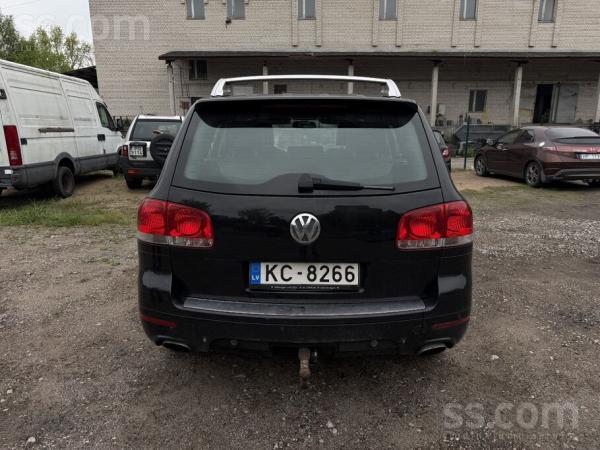 Melns Volkswagen Touareg 2005 Ventspils, ar dzinēja tilpumu 3.20 L un nobraukumu 236 tūkst. km par 5300 €, foto 5 vietnē AUTOMOTO.COM.LV