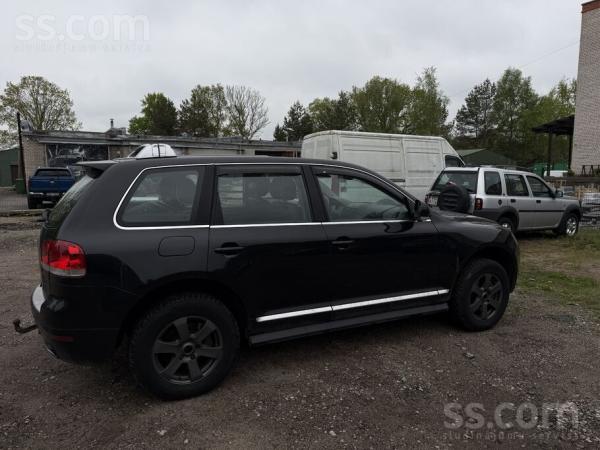 Melns Volkswagen Touareg 2005 Ventspils, ar dzinēja tilpumu 3.20 L un nobraukumu 236 tūkst. km par 5300 €, foto 6 vietnē AUTOMOTO.COM.LV