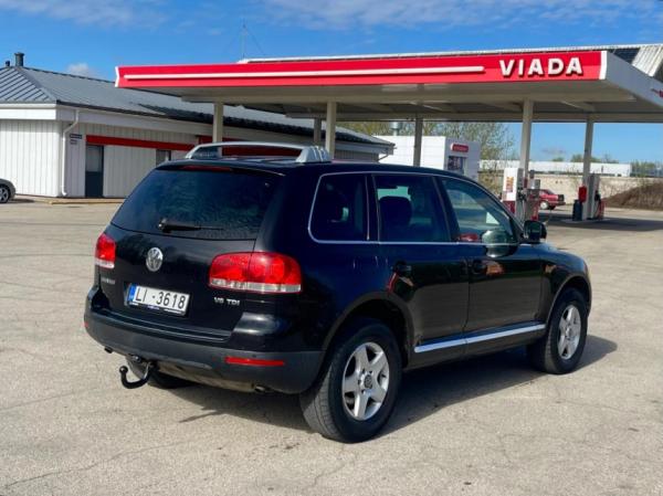 Black Volkswagen Touareg 2005 in Riga, with an engine capacity of 3.00 L and mileage of 0 thousand km for 4900 €, photo 5 on AUTOMOTO.COM.LV