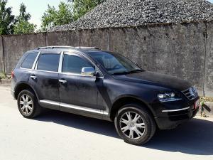 Black Volkswagen Touareg 2005 in Tallinn, with an engine capacity of 3.00 L and mileage of 316 thousand km for 1199 €, photo  on AUTOMOTO.COM.LV