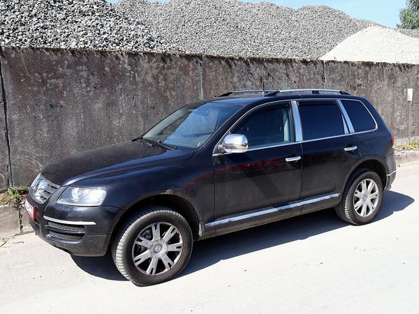 Black Volkswagen Touareg 2005 in Tallinn, with an engine capacity of 3.00 L and mileage of 316 thousand km for 1199 €, photo 2 on AUTOMOTO.COM.LV