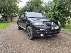 Melns Volkswagen Touareg 2005 Saldus, ar dzinēja tilpumu 3.00 L un nobraukumu 390 tūkst. km par 4500 €, foto 3 vietnē AUTOMOTO.COM.LV
