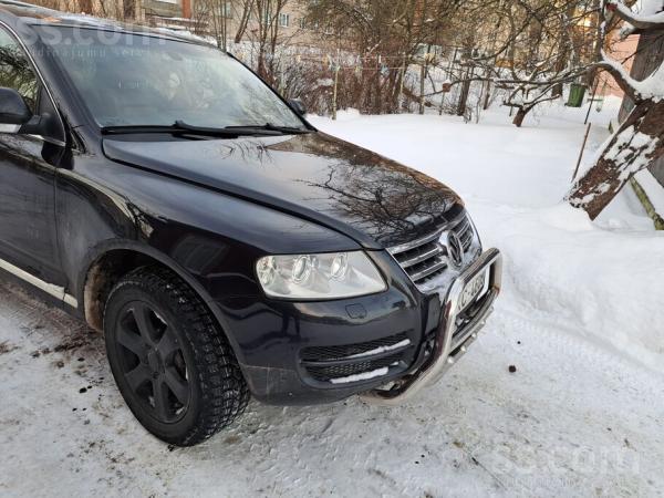 Black Volkswagen Touareg 2005 in Rezekne, with an engine capacity of 3.00 L and mileage of 362 thousand km for 1800 €, photo 1 on AUTOMOTO.COM.LV