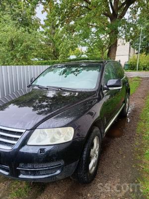 Melns Volkswagen Touareg 2005 Ludza, ar dzinēja tilpumu 3.00 L un nobraukumu 178 tūkst. km par 4700 €, foto 1 vietnē AUTOMOTO.COM.LV