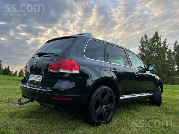 Black Volkswagen Touareg 2005 in Cesis, with an engine capacity of 2.50 L and mileage of 360 thousand km for 3200 €, photo 10 on AUTOMOTO.COM.LV