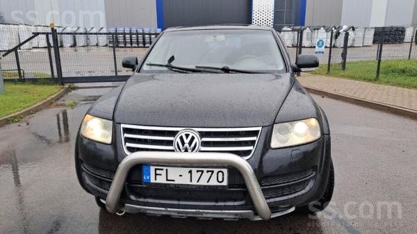 Melns Volkswagen Touareg 2005 Rīga, ar dzinēja tilpumu 3.00 L un nobraukumu 327 tūkst. km par 3200 €, foto 3 vietnē AUTOMOTO.COM.LV