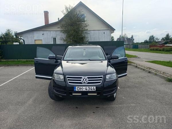 Melns Volkswagen Touareg 2005 Daugavpils, ar dzinēja tilpumu 3.00 L un nobraukumu 343 tūkst. km par 3400 €, foto 1 vietnē AUTOMOTO.COM.LV