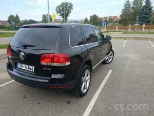 Melns Volkswagen Touareg 2005 Daugavpils, ar dzinēja tilpumu 3.00 L un nobraukumu 343 tūkst. km par 3400 €, foto 5 vietnē AUTOMOTO.COM.LV
