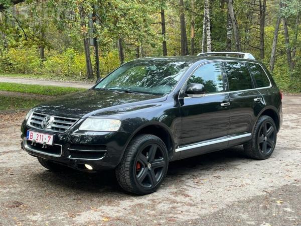 Volkswagen Touareg 2005 Rīga vietnē Melns Volkswagen Touareg 2005 Rīga, ar dzinēja tilpumu 2.50 L un nobraukumu 0 tūkst. km par 3799 €, foto 1 vietnē AUTOMOTO.COM.LV