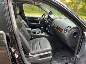 Melns Volkswagen Touareg 2005 Rīga, ar dzinēja tilpumu 2.50 L un nobraukumu 0 tūkst. km par 3799 €, foto 23 vietnē AUTOMOTO.COM.LV
